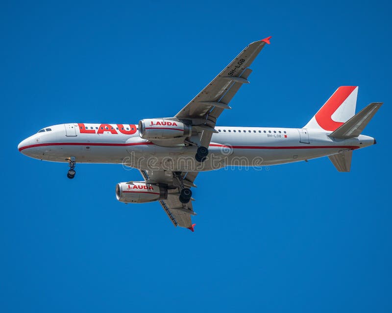 Lauda Air Airbus A320 Flying in the Blue Sky Editorial Photo - Image of ...