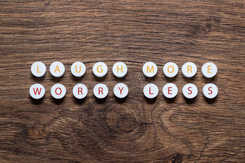 Laugh More Worry less - Word Concept on Building Blocks, Text Stock ...
