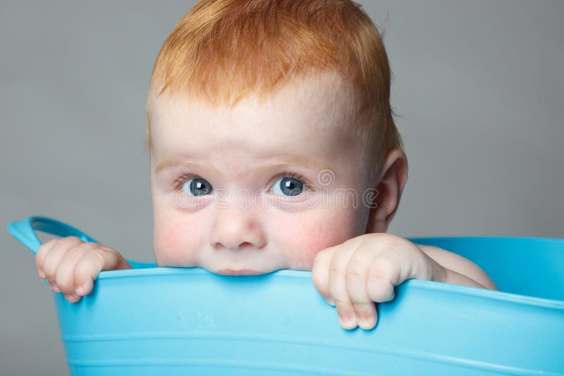 Laughing Baby in a Blue Bucket Stock Image - Image of person, small ...