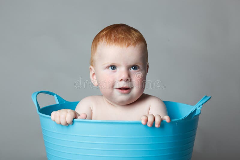 Laughing Baby in a Blue Bucket Stock Photo - Image of bucket, funny ...