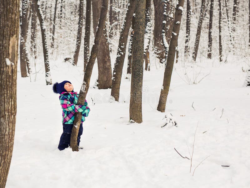 Laughing Baby Girl Lying in the Snow Stock Image - Image of giggle ...