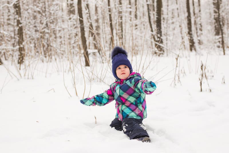 Laughing Baby Girl Lying in the Snow Stock Image - Image of giggle ...
