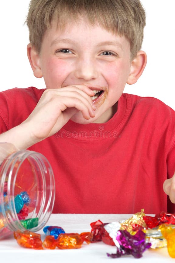 Laughing boy with candy stock image. Image of high, food - 3327051
