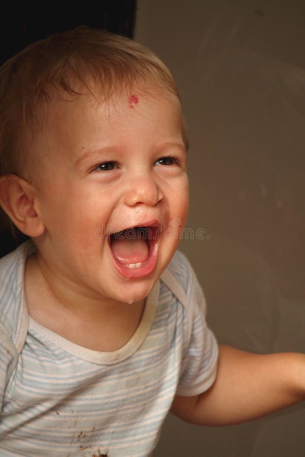 Laughing Boy with Clip Left Stock Photo - Image of face, connection ...
