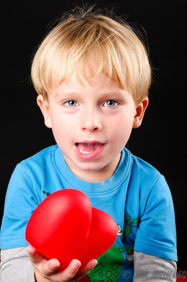 Laughing boy with heart stock photo. Image of smile, watch - 34966390