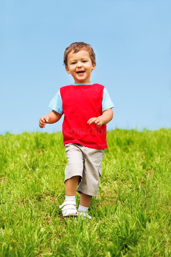 Laughing boy running stock image. Image of happiness - 20173125