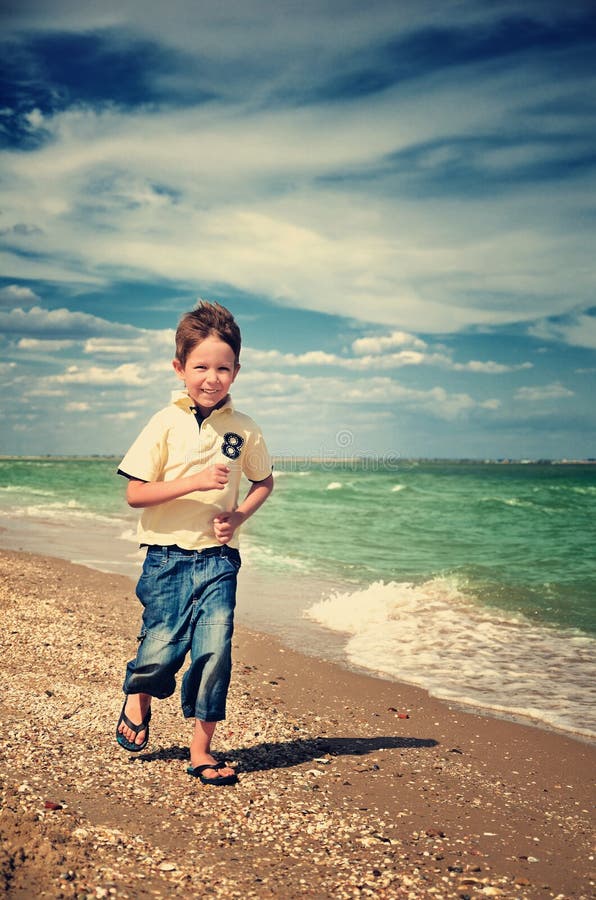 Laughing Boy Runs Towards Toned Stock Photo - Image of little, horizon ...
