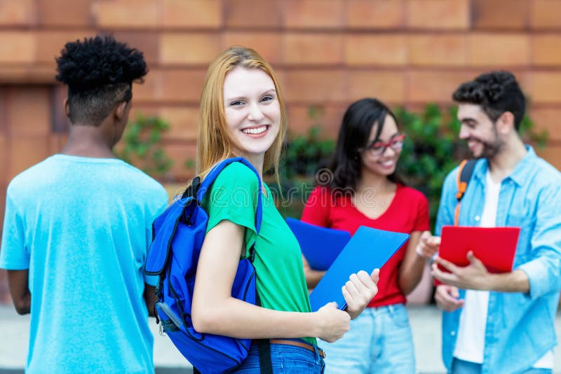 Laughing British Female Student with Group of Students Stock Photo ...