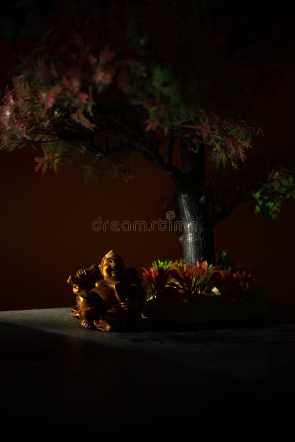 Laughing Buddha Statue on Under the Tree. Statue of Laughing Buddha ...