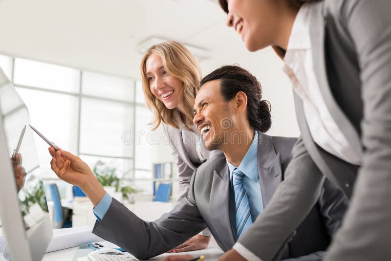Laughing business people stock image. Image of computer - 63496511