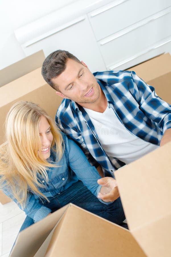 Laughing Couple with Cardboard Boxes Stock Photo - Image of move ...