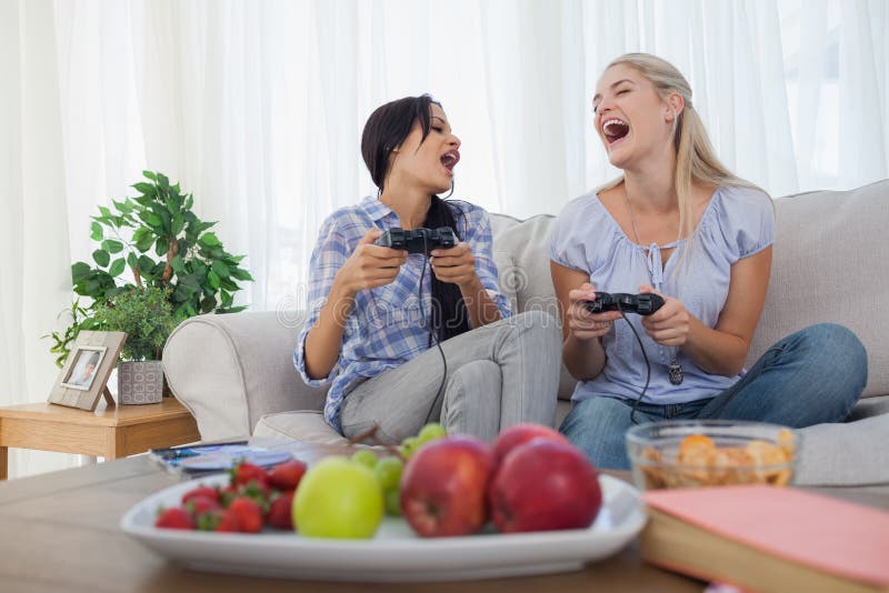 Laughing Friends Playing Video Games and Having Fun Stock Image - Image ...