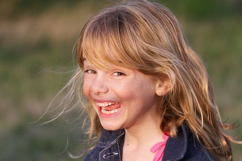 Laughing Girl Lying in Grass Stock Photo - Image of fresh, laugh: 22292940