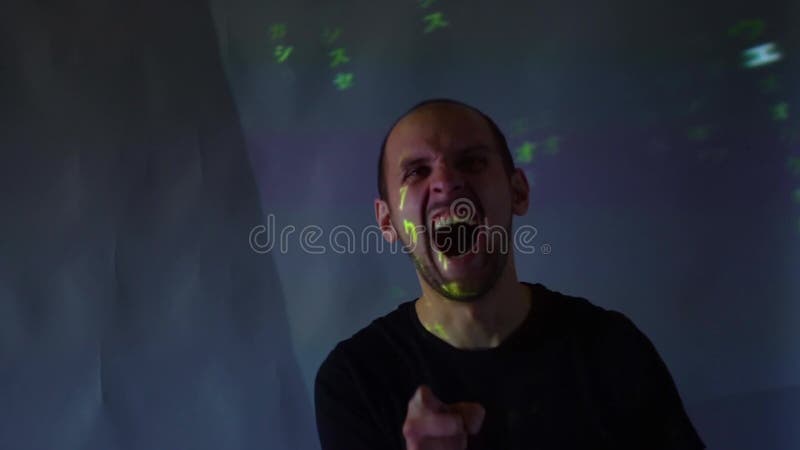 Laughing Hacker with Binary Codes from Monitor Stock Video - Video of ...