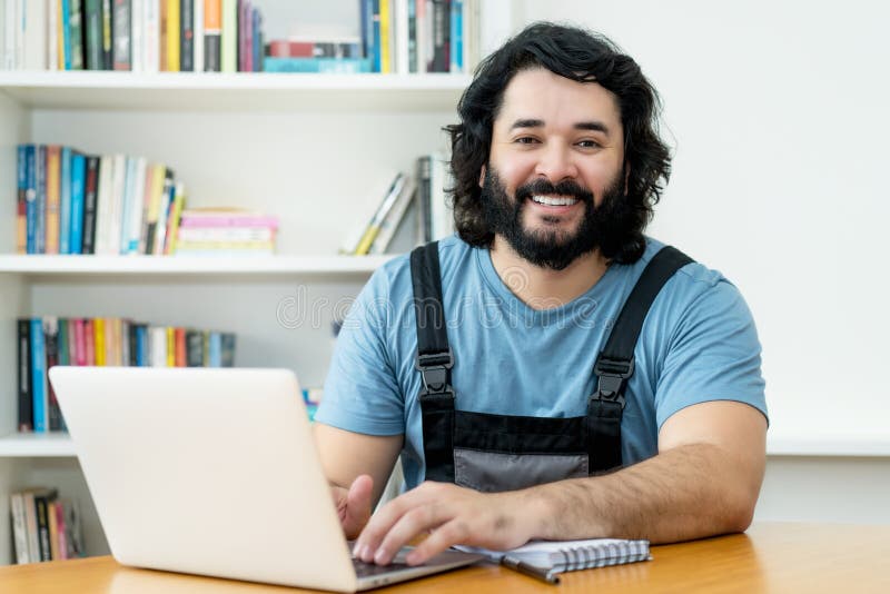 Laughing Handyman with Beard Working at Computer Stock Image - Image of ...
