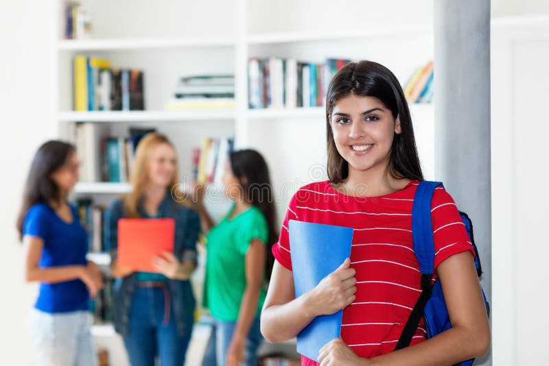 Laughing Hispanic Female Student with Group of Multi Ethnic College ...