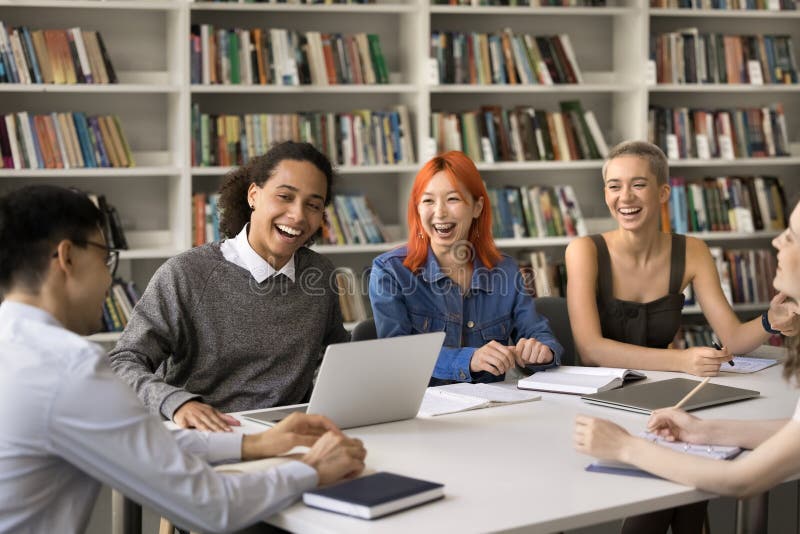 Laughing Interracial Group of Students Studying in Library Stock Photo - Image of classroom ...