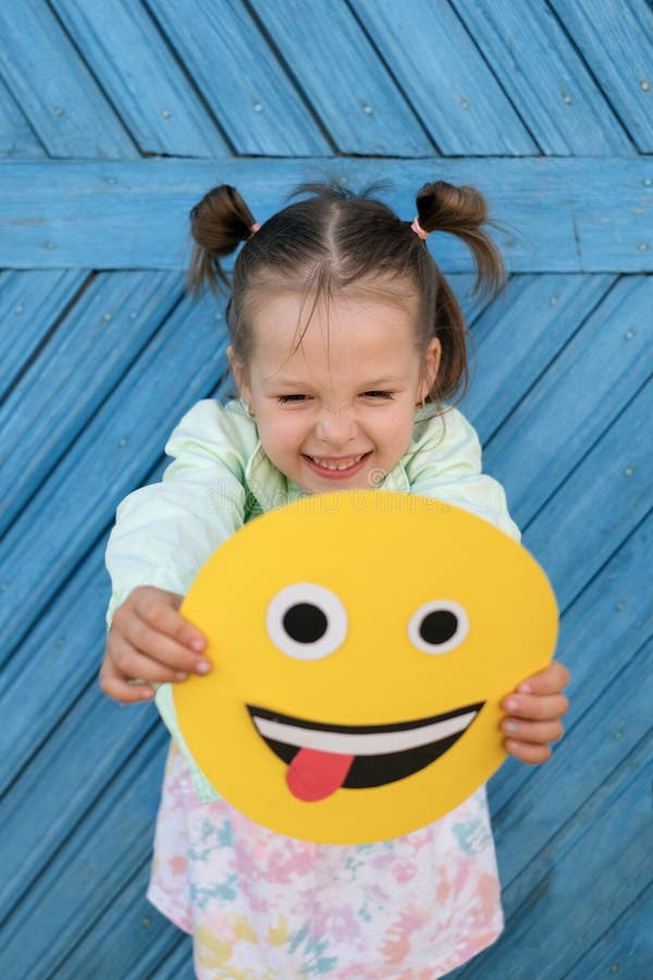 A Laughing, Joyful Girl Shows a Grimacing Smile Face Stock Image ...