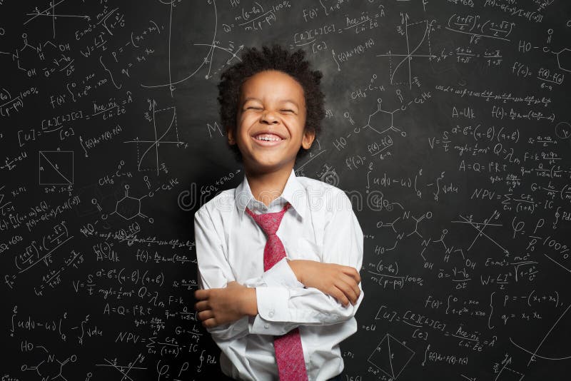 Laughing Kid Student Boy on Chalkboard Background with Science Formulas ...