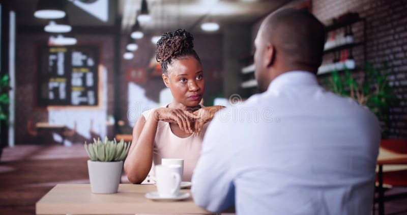 Laughing Male and Female Sitting in Cafe Drinking Coffee Stock Photo ...