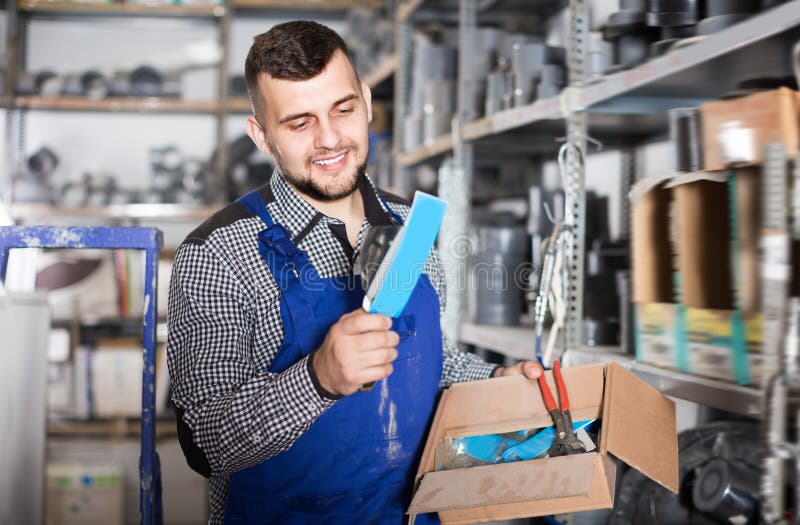 Laughing Male Worker Showing His Working Tools Stock Image - Image of ...