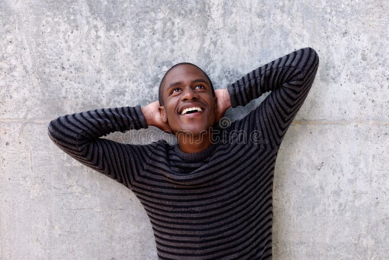 Young Black Man Laughing Hand Behind Head Stock Photos - Free & Royalty ...