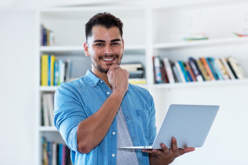 Laughing Mexican Hipster Man with Beard and Computer Stock Photo ...