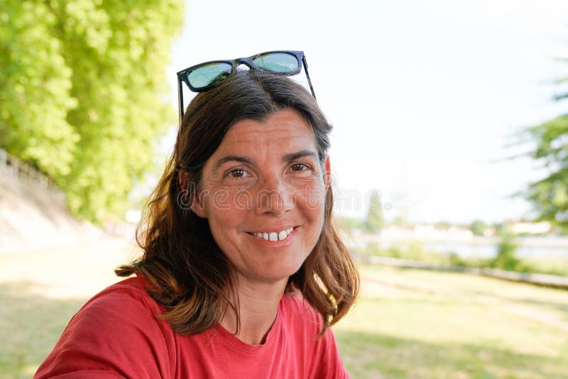 Laughing Middle Aged Cute Smiling Woman in Park Stock Image - Image of ...