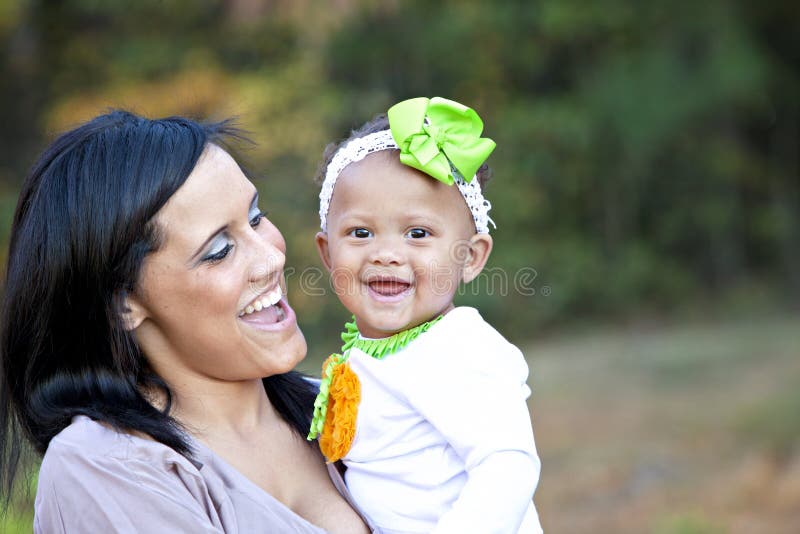 Laughing mother and child stock photo. Image of cute - 21645656