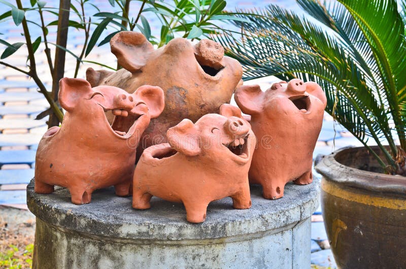 Laughing pig statue stock image. Image of hand, making - 38452905