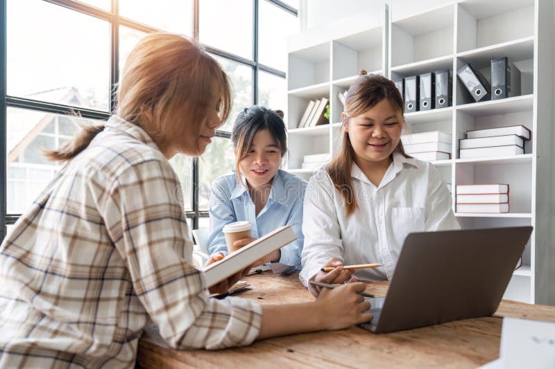 Laughing Students Use Laptop Studying or Having Fun Using Laptop Sit at ...