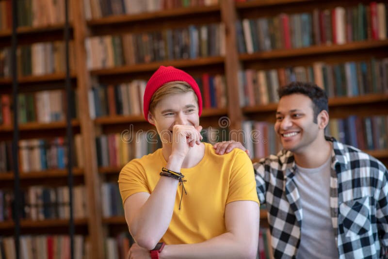 Two Young Handsome Men Standing in the Room and Laughing Stock Image ...