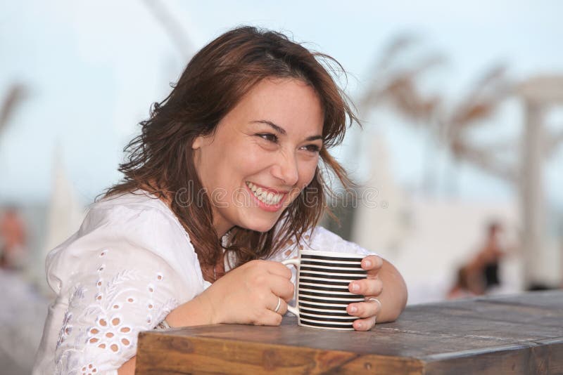 Laughing Woman with a Cup of Drink Stock Photo - Image of girl ...