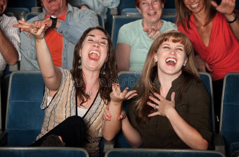 Laughing Women in Audience stock photo. Image of reaction - 23102404