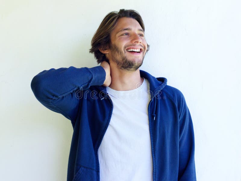 Laughing Young Man with Hand Behind Head Stock Image - Image of male ...