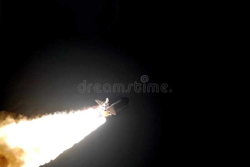 The Launch of a Space Rocket at Night, in a Dark Sky. Copy Space ...