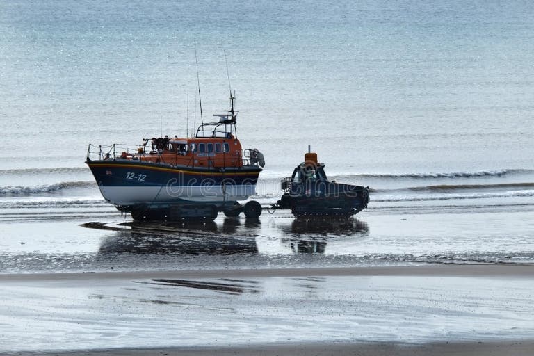Launching Lifeboat from Beach at Low Tide. Editorial Photo - Image of ...