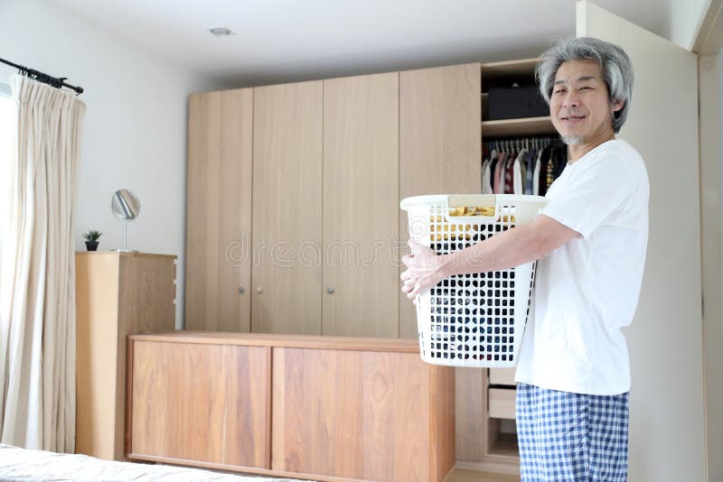 Elderly Person Carrying Laundry Stock Photos - Free & Royalty-Free ...