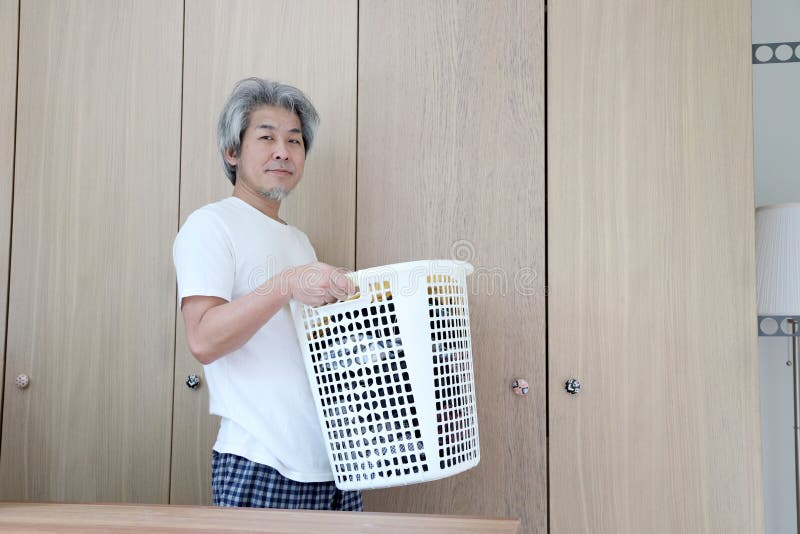 Elderly Person Carrying Laundry Stock Photos - Free & Royalty-Free ...