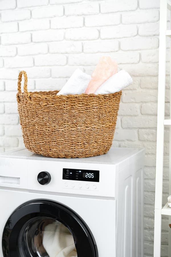 Laundry Basket on Washing Machine in a Laundry Room Stock Image - Image ...