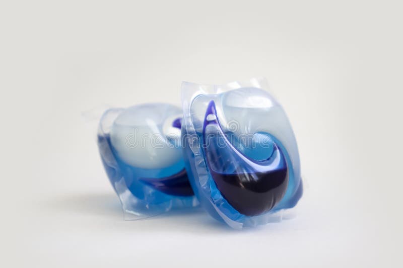 Laundry Capsules on a Light Background Machine Stock Image - Image of ...