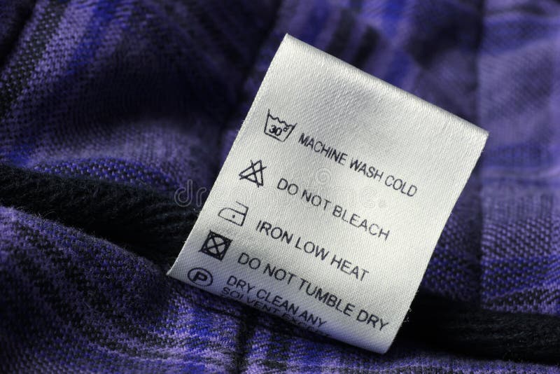 Laundry Care Label on Scotch Textile Background Stock Image - Image of ...