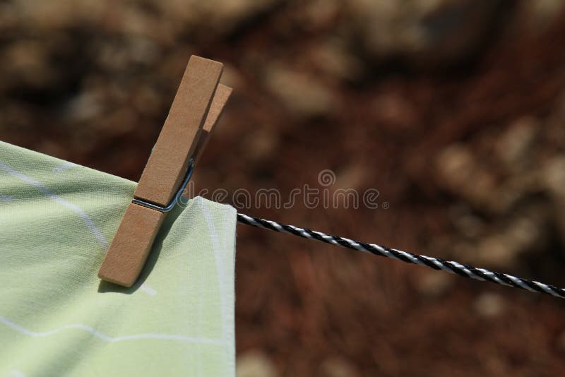 Laundry clip on a string stock image. Image of hang - 255473961