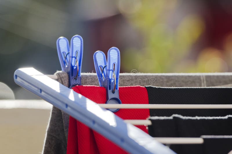 Laundry clips and clothing stock image. Image of domestic - 42231779