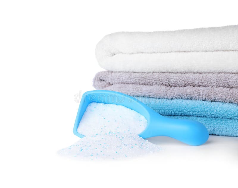 Laundry Detergent in Plastic Measuring Scoop and Towels Stock Photo ...