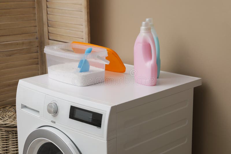 Laundry Detergents on Washing Machine Stock Photo - Image of domestic ...