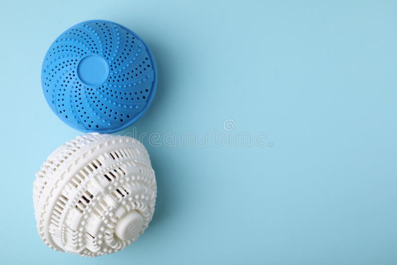 Laundry Dryer Balls on Light Blue Background, Flat Lay. Space for Text ...