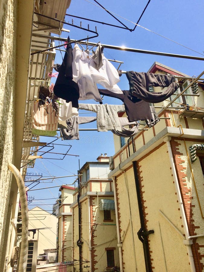 Laundry Drying Outside on a Clothesline Stock Photo - Image of cleaning ...