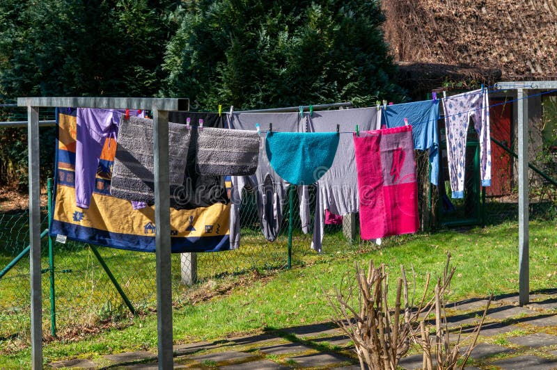 Laundry Drying in the Sun in a Laundry Area Stock Illustration ...