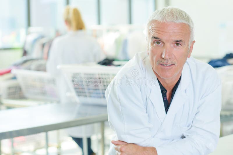 Laundry employee posing stock photo. Image of load, chore - 188229550